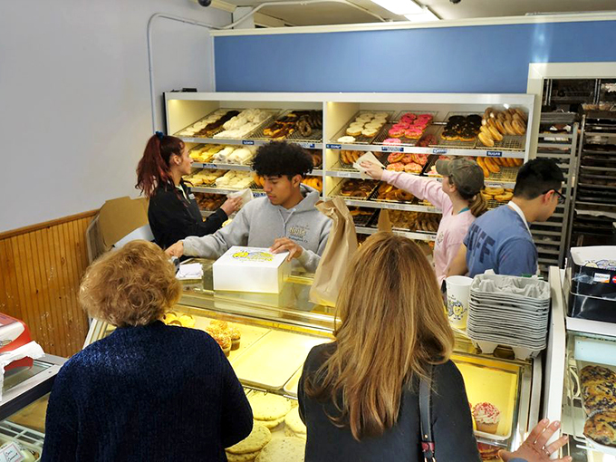 The counter exchange: that magical moment when money transforms into donuts and all seems right with the world.