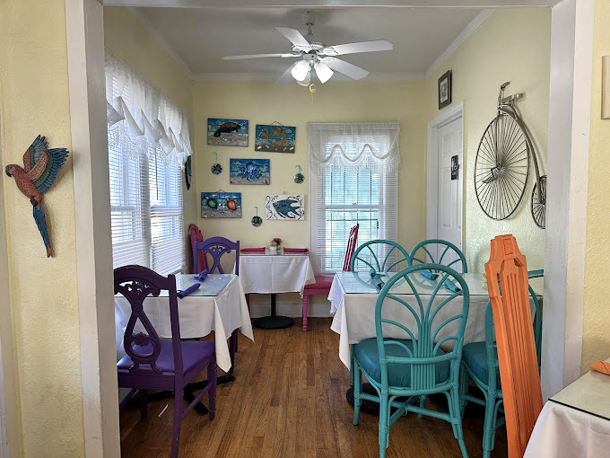 Dining room decor that feels like Florida's coastal charm decided to throw a party and invited all the happy colors.
