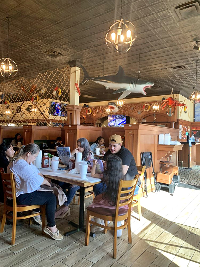 Where strangers become temporary family, united by the universal language of "please pass the crab crackers" and knowing nods of seafood satisfaction.