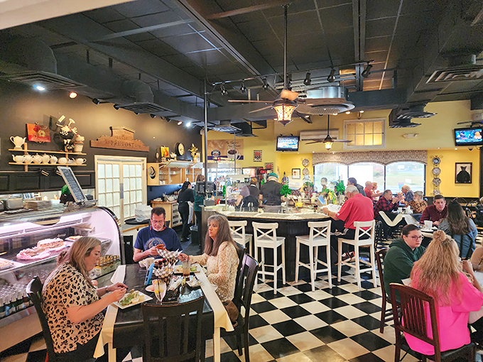 The true measure of a great breakfast spot: happy diners too busy enjoying their food to notice they're being photographed. Community happens over coffee.