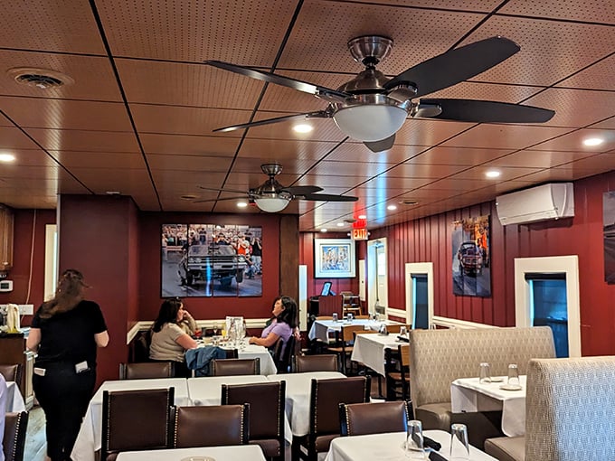 A dining room where conversations flow as smoothly as the wine, with enough space between tables to ensure your dinner gossip stays private.