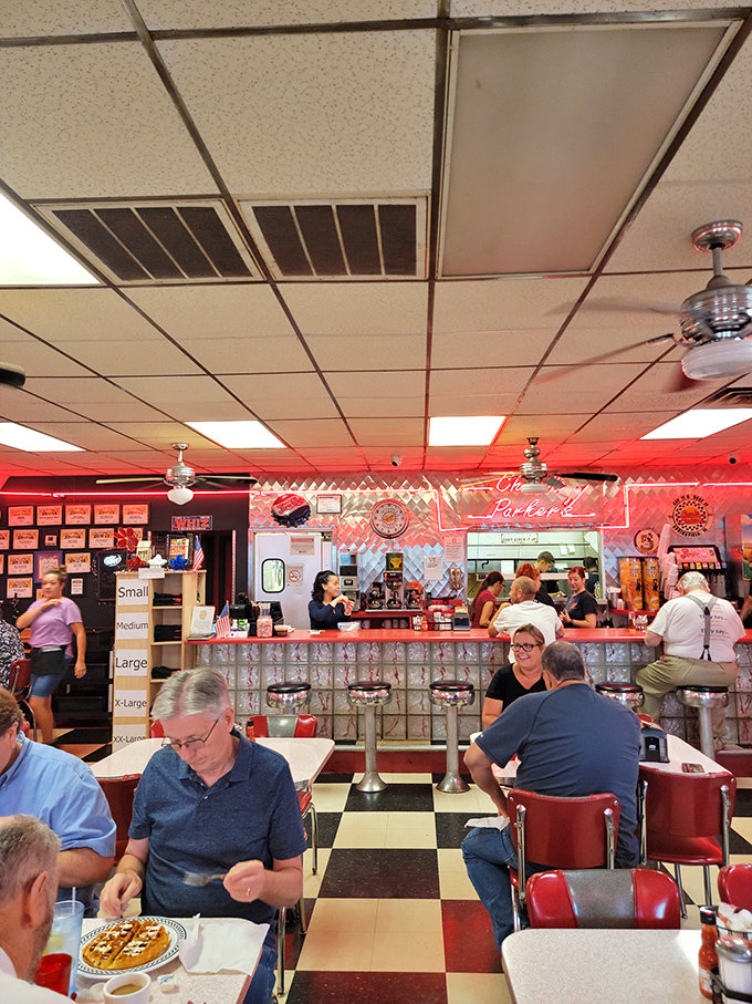 Where strangers become friends over coffee refills and shared appreciation for proper hash browns. This is America's breakfast parliament in session.