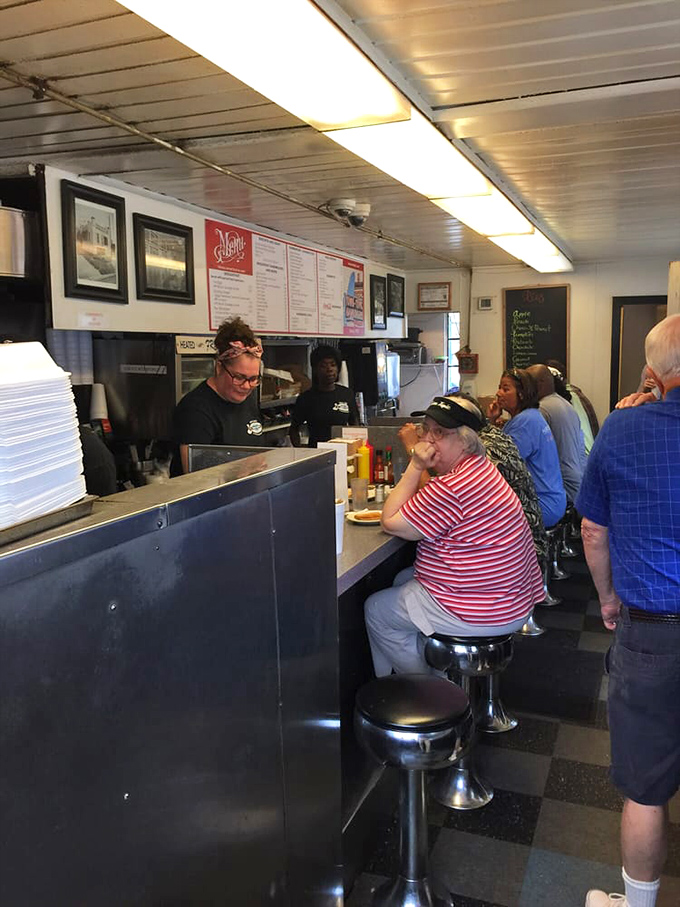 Strangers becoming temporary neighbors at the counter. In a diner, everyone is family for the duration of a meal.