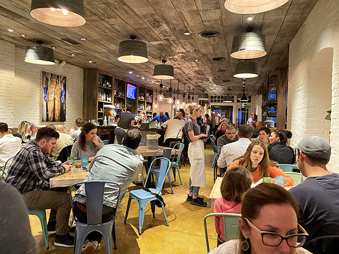 Beneath rustic wooden beams, the bar beckons with promises of perfectly paired libations for your seafood feast. 
