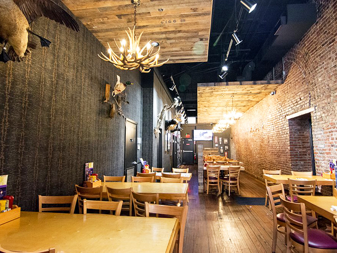 The dining room's wooden planks and exposed brick tell stories of meals past, while comfortable seating invites you to create your own food memories.