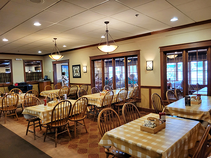 The dining room whispers "stay awhile" with its warm woods, checkered tablecloths, and chairs that have supported generations of happy eaters.