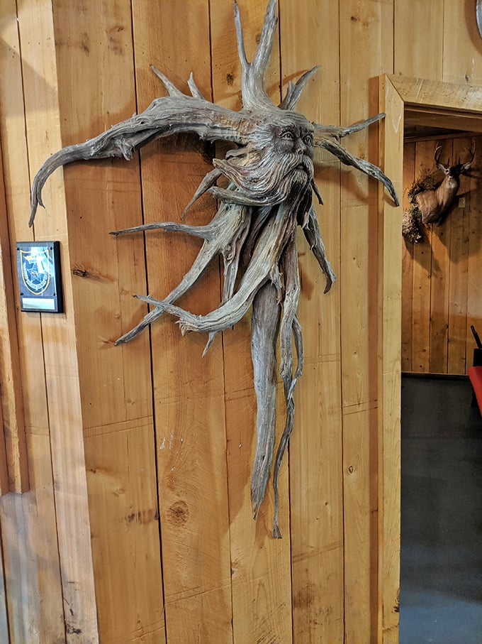 Driftwood sculpture: Art that watches you eat! This driftwood creation keeps silent vigil over generations of happy diners&mdash;a guardian spirit of good taste.