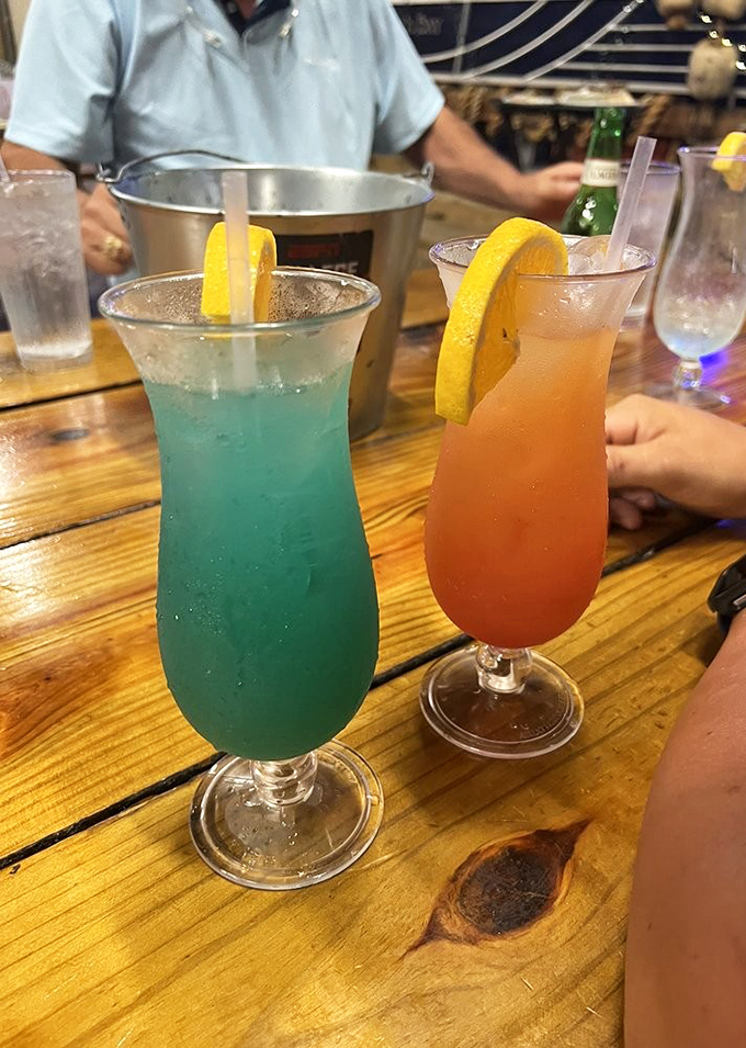 Vacation in liquid form, no sunscreen required. These vibrant cocktails&mdash;one blue as the lake, one sunset-orange&mdash;promise refreshment with a view.