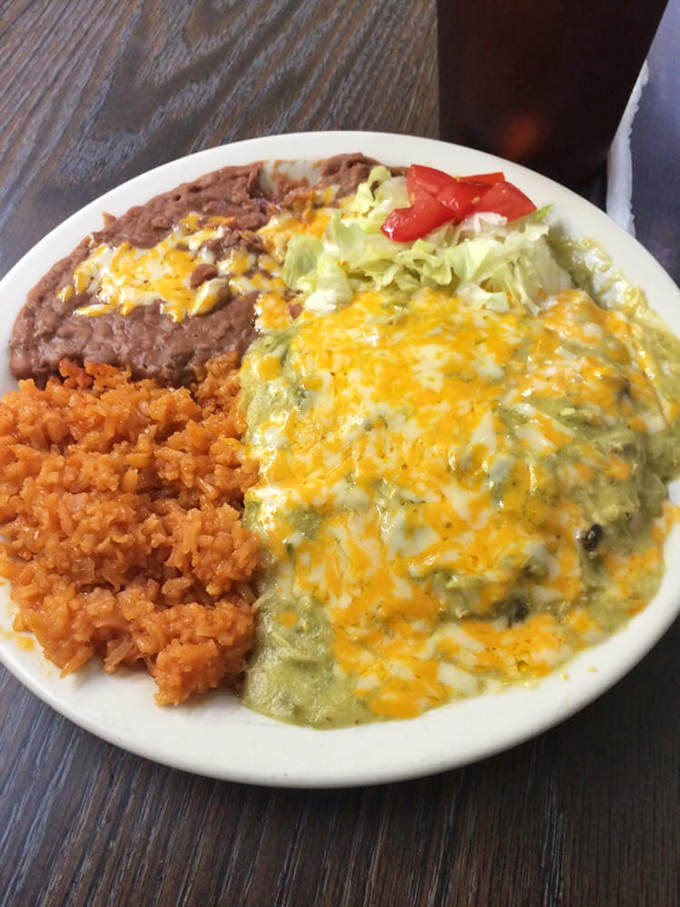 This plate doesn't just feed you&mdash;it hugs you from the inside. The green chile sauce and melted cheese create edible poetry.