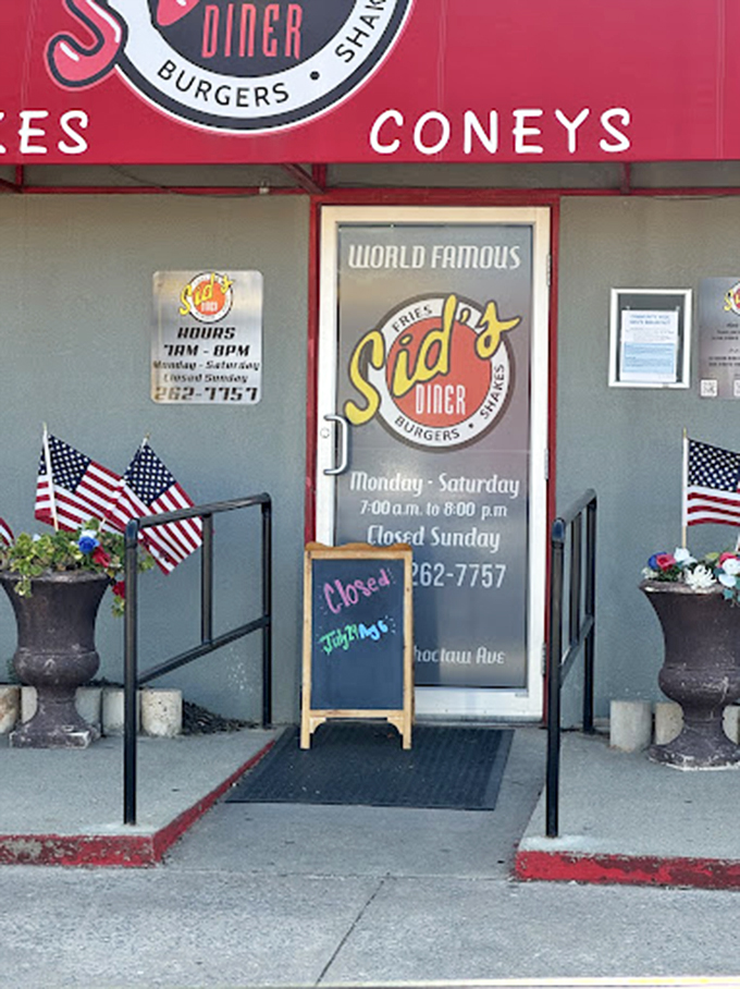 The entrance promises "World Famous" delights, and those American flags stand guard like sentinels protecting a national treasure of taste.