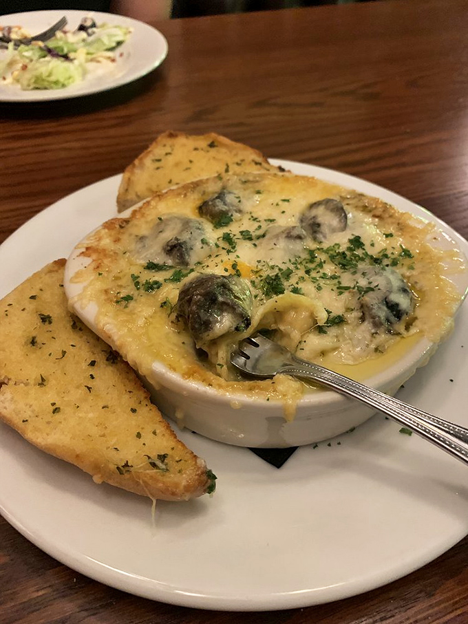 Escargot swimming in butter and garlic proves that sometimes the most intimidating menu items make for the most memorable bites.