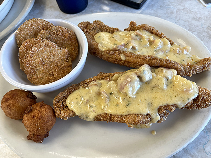 Country fried steak smothered in gravy that could settle family feuds. The crispy-to-creamy ratio here is what mathematicians call "perfect harmony."