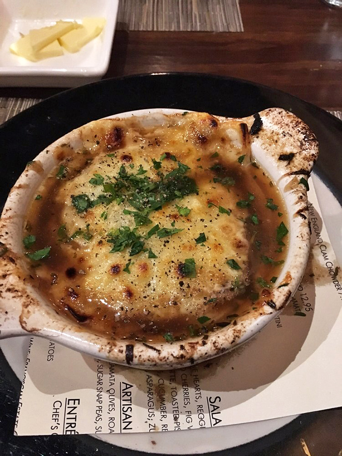 French onion soup that's worth the inevitable cheese pull photo. The crusty, broiled top is like a delicious force field protecting the savory treasure below.
