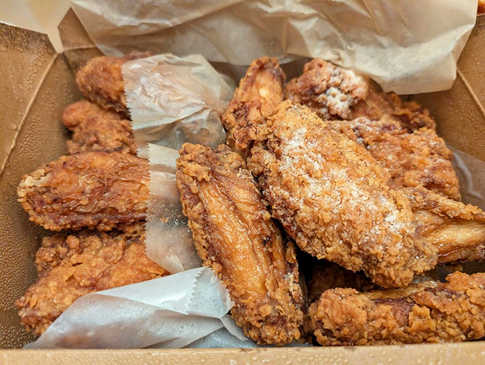 Fried chicken that looks like it was taught the secret handshake to the Crispy Hall of Fame. Each piece promises a symphony of crunch.