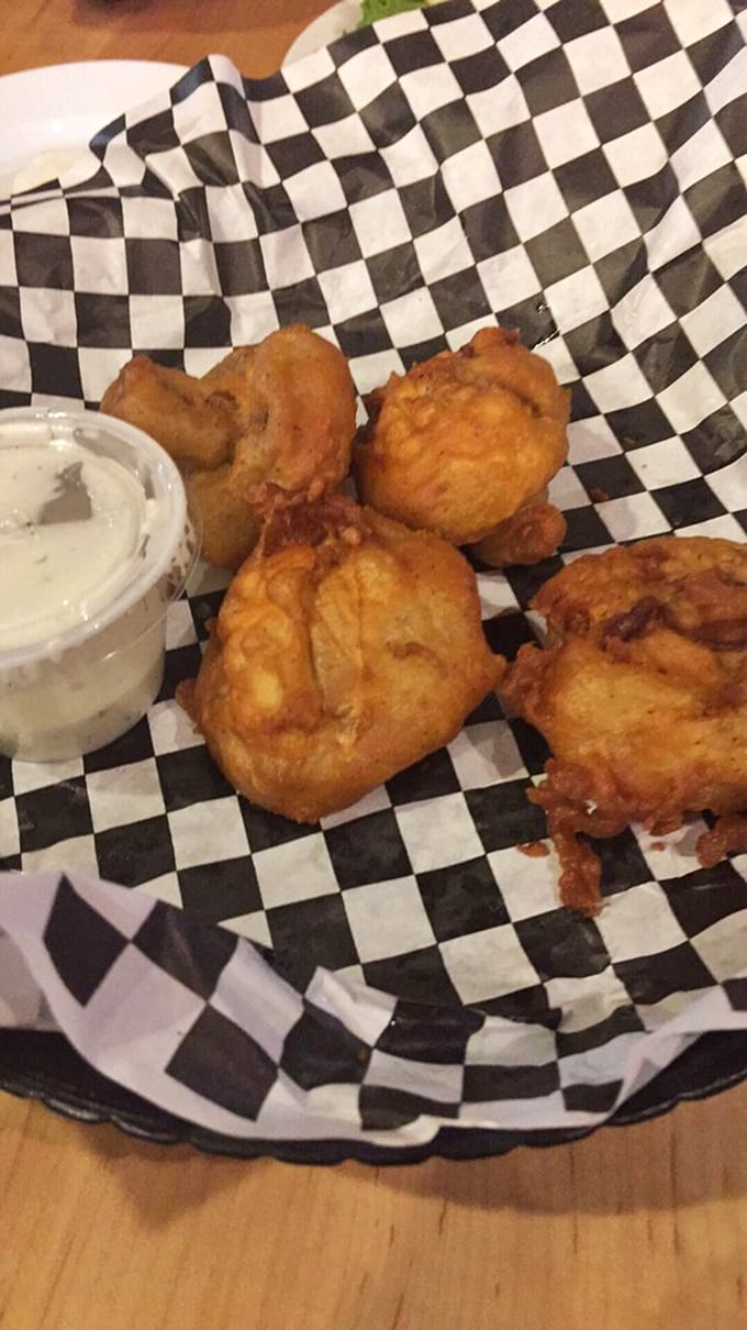 Golden-fried mushrooms that could convert even the most committed vegetable skeptic. Crispy outside, juicy inside—nature's perfect design improved by batter.