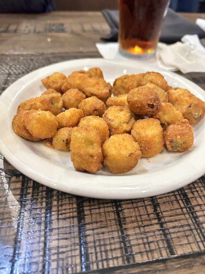 Golden-fried okra that crackles with each bite&mdash;Southern comfort in bite-sized form. This isn't a side dish; it's a regional handshake.