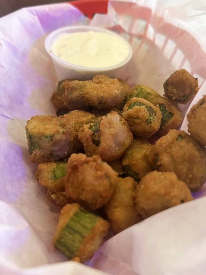 Fried okra: the unsung hero of bar appetizers. These golden nuggets make a compelling case for vegetables being better when they're breaded and fried.