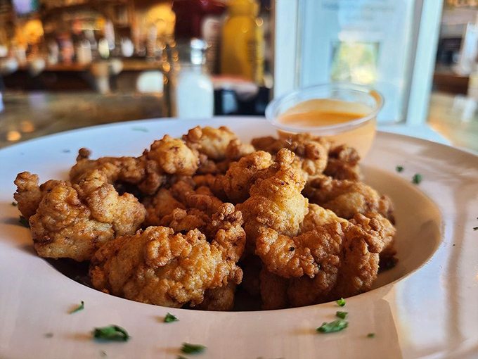 Golden-fried bites that dare you to guess their origin. These crispy gator nuggets offer the perfect introduction to adventurous eating for the culinary curious.
