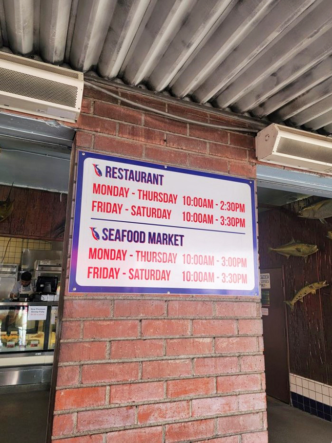 The hours posted like a gentle warning: "Plan accordingly or miss out." Closing at 2:30pm weekdays means this is strictly a lunch affair.