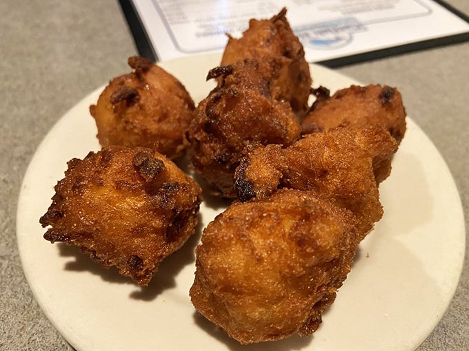Hush puppies that could make a Southerner weep with joy&mdash;crispy exterior giving way to a tender, onion-flecked interior that demands silence while savoring.