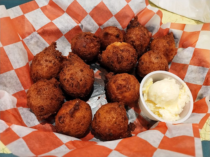 Hushpuppies that don't need to speak for themselves&mdash;golden-brown, crispy exterior giving way to tender cornmeal interior that whispers "Southern cooking" with every bite.