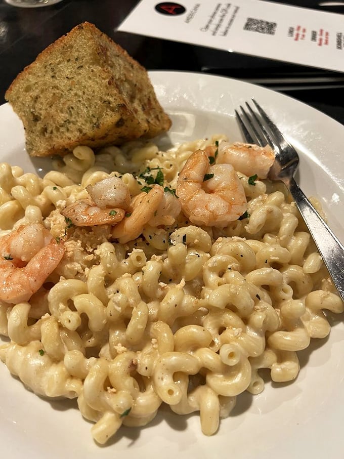 Mac and cheese with shrimp&mdash;because sometimes comfort food needs to dress up and go somewhere fancy. Childhood favorite meets grown-up indulgence.