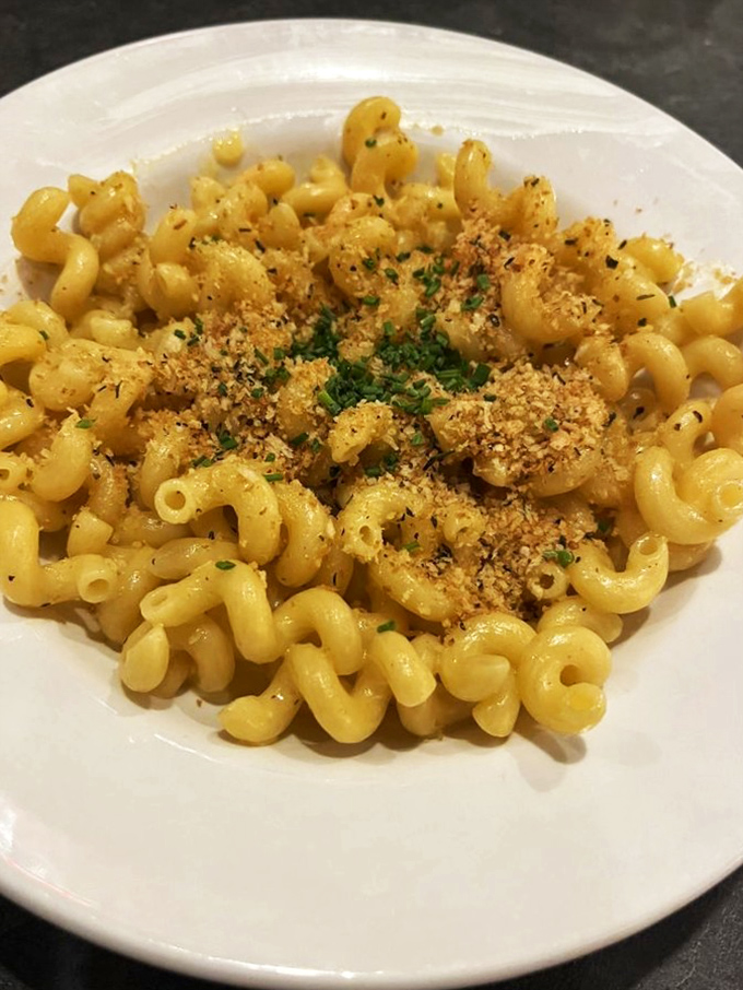 Mac and cheese that would make your grandmother jealous: Cavatappi pasta embraced by creamy cheese and topped with toasted breadcrumbs &ndash; comfort food's highest calling.