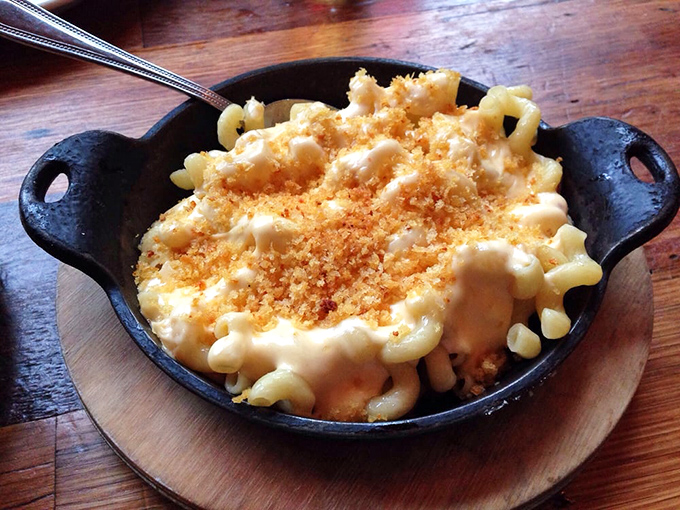 Mac and cheese that doesn't know the meaning of "subtle." This skillet of molten comfort comes with a crunchy top hat that deserves a standing ovation.