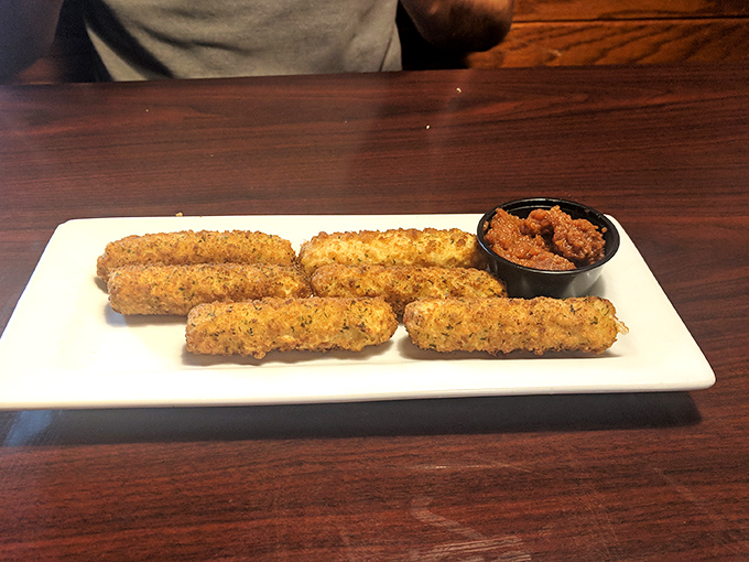 Mozzarella sticks that achieve the perfect cheese-pull-to-crunch ratio. The marinara isn't just a dip &ndash; it's their soulmate.