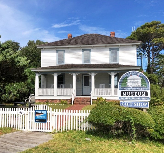 The Ocracoke Preservation Society Museum, where island history is preserved behind white picket fences and inside stories await curious minds.