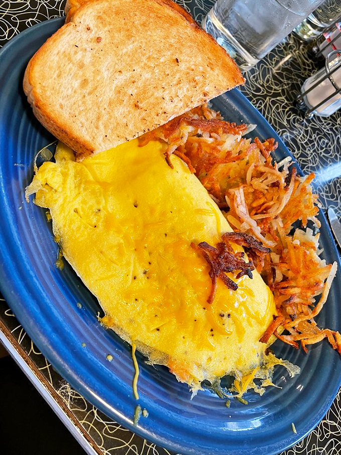 This isn't just an omelet&mdash;it's a golden envelope delivering a message of cheese-filled happiness to your taste buds.