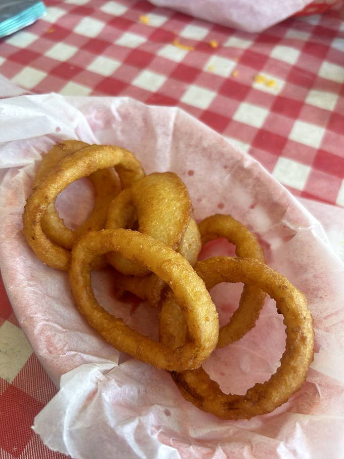 Onion rings with the structural integrity to support your dipping ambitions. Golden halos of crispy perfection.