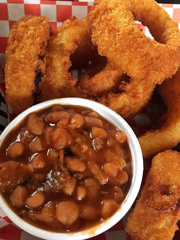 Onion rings with a side of baked beans&mdash;crispy, golden halos of happiness. The perfect supporting cast for the barbecue main event.