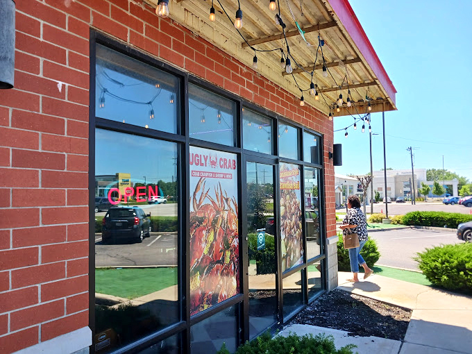 The exterior may whisper "strip mall," but the window displays boldly shout "seafood paradise lies within!"