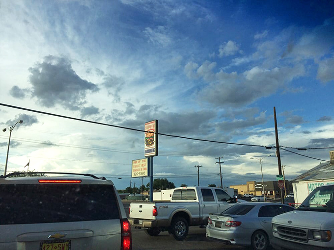 The parking lot at sunset&mdash;where hungry pilgrims gather for their burger benediction under New Mexico's dramatic skies.