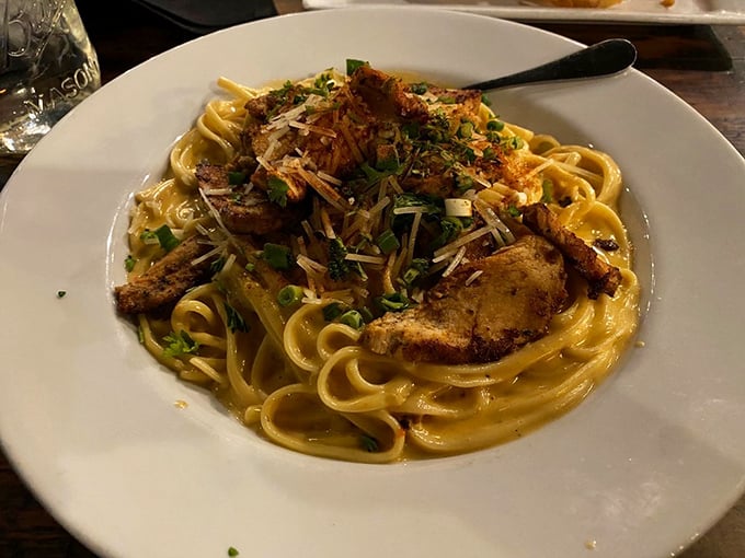 Pasta that proves the South and Italy are secret cousins. That creamy sauce clings to each strand like it's afraid of missing the flavor party.