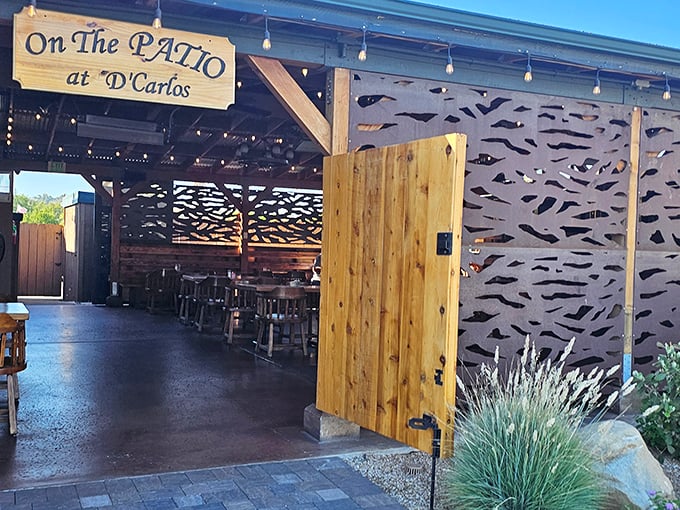 "On The Patio at D'Carlos"&mdash;where fresh air seasons every bite. Al fresco dining with string lights that twinkle like culinary constellations.