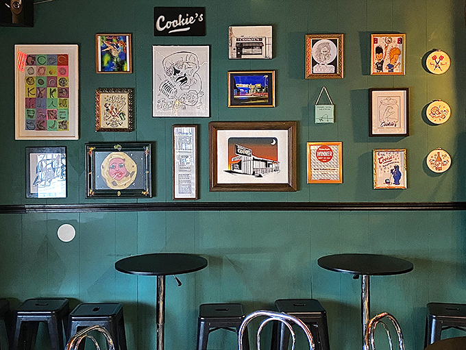 The gallery wall serves as Cookie's community yearbook, capturing fragments of its history, personality, and the characters who've called it home.