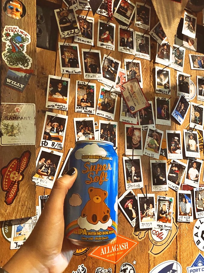 The photo wall chronicles a community built around great food. Each Polaroid represents someone who's joined the burger brotherhood.