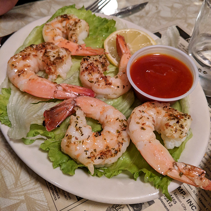 Plump shrimp served simply with cocktail sauce and lemon. Sometimes the ocean's best offerings need nothing more than minimal intervention and maximum respect.