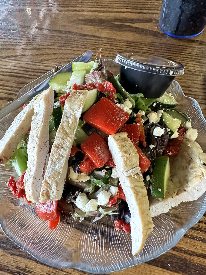 A Mediterranean salad that offers a lighter option without sacrificing flavor. Those strips of pita bread are perfect for scooping up every last feta crumble.