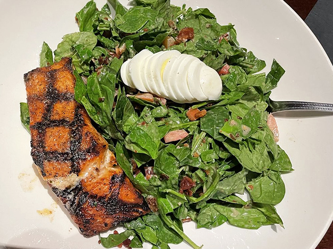 This isn't just salad &ndash; it's what happens when vegetables decide to dress for a special occasion and bring salmon as their plus-one.