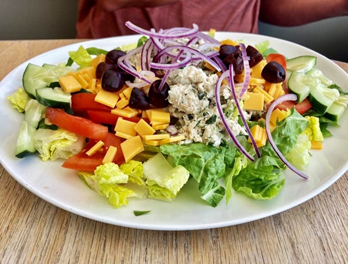 This isn't just a salad; it's nature's apology for all the cheesecake you're about to eat, dressed in vibrant colors and good intentions.