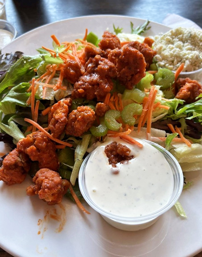 Buffalo chicken meets garden freshness in a plate that satisfies the angel on one shoulder and the devil on the other.