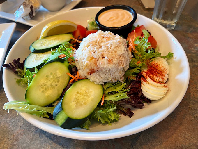 The Dungeness crab salad arrives like a work of art &ndash; sweet meat piled high, surrounded by fresh vegetables and that distinctive thousand island dressing.