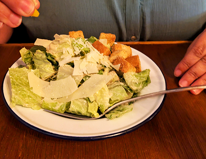 Even the Caesar salad gets the royal treatment here&mdash;crisp romaine, generous parmesan, and croutons that actually taste like bread, not cardboard.