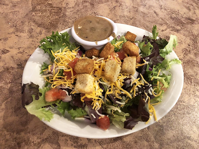 A salad that doesn't apologize for being healthy, dressed with enough personality to hold its own against the sandwich heavyweights on the menu.