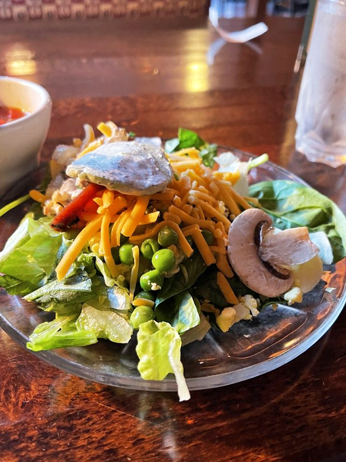 The salad bar isn't an afterthought but a fresh prelude &ndash; crisp vegetables, cheese, and mushrooms arranged with surprising care.