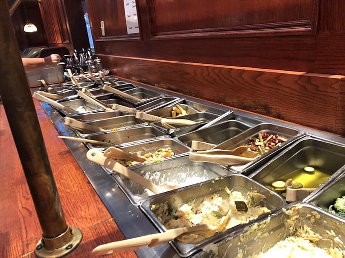 The salad bar: where good intentions meet delicious reality. Load up on vegetables to justify that burger you're about to demolish.