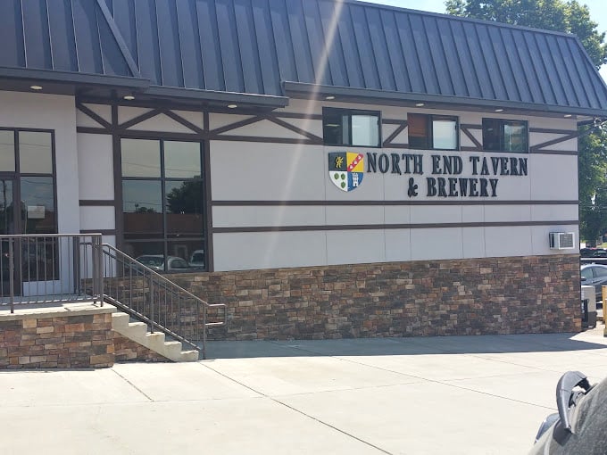 The sign promises two of life's greatest pleasures &ndash; a tavern for comfort and a brewery for joy. Some promises are actually kept.